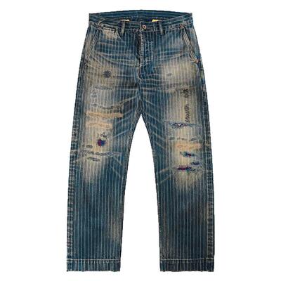 威络美式复古破洞巴黎扣牛仔裤男