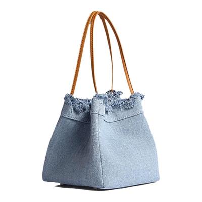 高质感文艺牛仔流苏水桶包