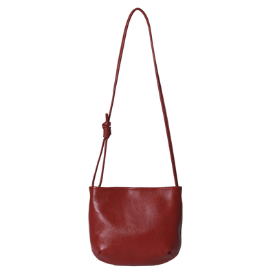 铂莱娜复古植鞣头层牛皮马鞍包