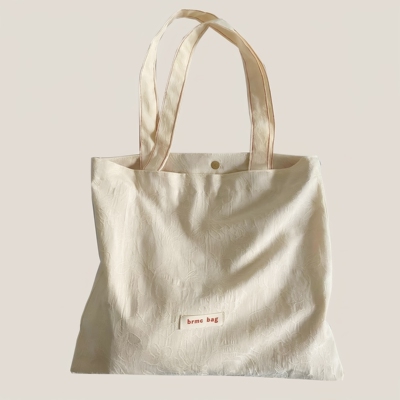 温柔风米白暗纹提花托特包女松弛