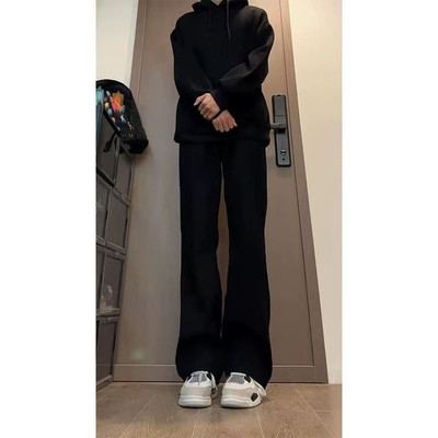 纯黑色柳叶弯刀牛仔裤男款