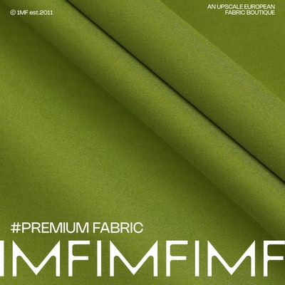 棉+氨纶面料绿色调风衣布料