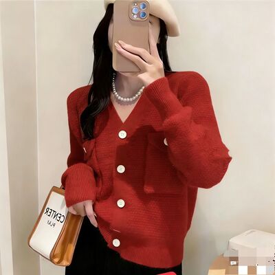 设计圣诞香风512150-2纯色新款秋季小众宽松波浪高级红色针织开衫