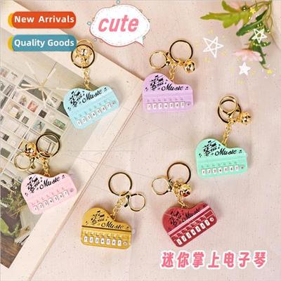 Mini handheld electronic piano game machine cute luminous ke