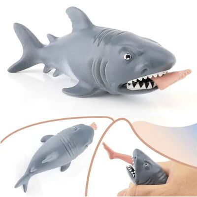Interesting man eating shark squeezing leg eating toy terrif