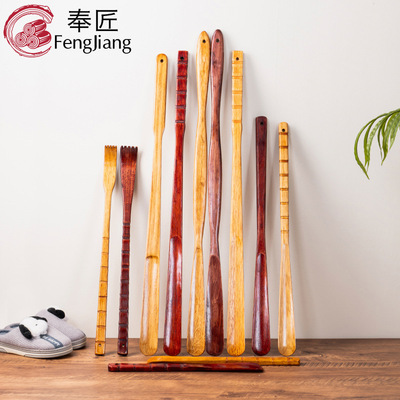 Shoe puller made of extra long solid wood, with a 75 centimeter long shoe puller that can be lifted without bending ove