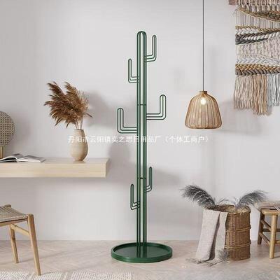 现代简约风设计师创意仙卧掌IFH人衣架落地室挂衣架衣小户型衣帽