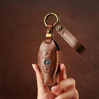 适用于奔驰GLK钥匙套E级C级R350老款GL高档E级GLC壳真皮保护壳扣