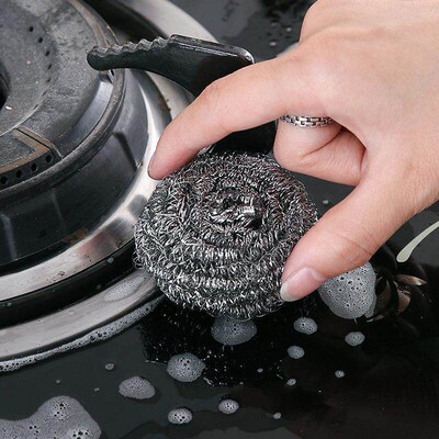A set of 6 steel wool scrubbing balls for kitchen use, ideal