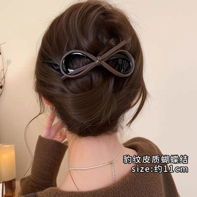 Leather bow twist clip, exuding elegance and sophistication