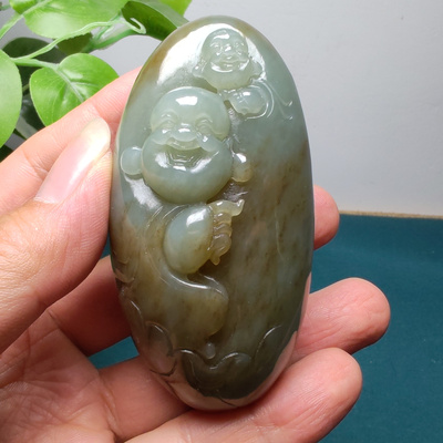 新疆且末蓝调糖玉佛童子手把件