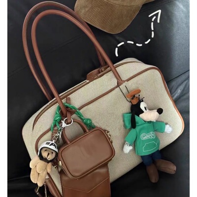 真皮手提保龄球帆布公文包女2025新款复古大容量百搭款单肩女包