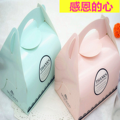 粉色手提切块蛋糕盒