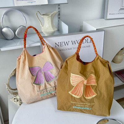 日系ball chain刺绣米色蝴蝶结环保袋帆布包女2024新款购物袋斜挎