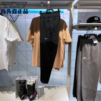 正品耐克长裤女子2023春夏新款运动防风梭织速干小脚裤DH6980-010