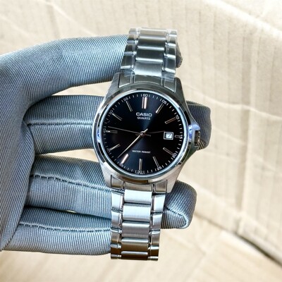 卡西欧手表男石英商务休闲简约指针日历情侣表 MTP-1183A-7A 1184