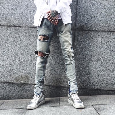 SUA血爪痕侧拉链破洞牛仔裤