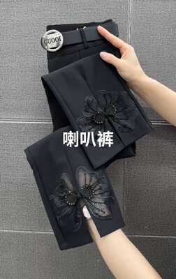 春秋黑色镂空印花八分裤