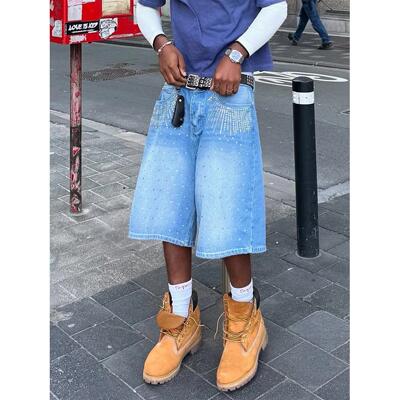 Men's oversized jeans look slim, wide legs, and a sense of