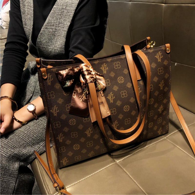 香港品牌包包女大容量2026新款高级感真皮手提托特包休闲单肩大包