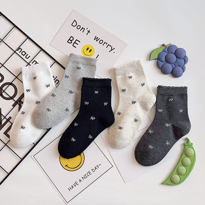 爱嘀嗒儿童袜子日系甜美蝴蝶结女宝秋冬季黑白灰精梳棉学生中筒袜