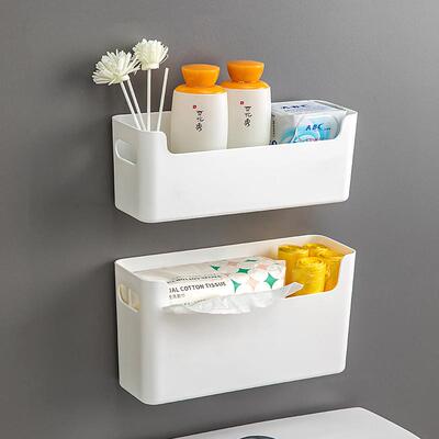 Pluralized plastics on the toilet wall above the toilet, fre
