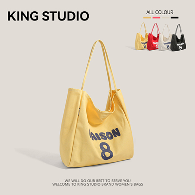 字母印花帆布包2025新款夏天学生上课通勤包大容量简约单肩托特包