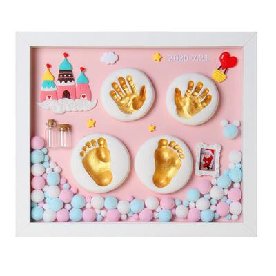 The babys hand prints the muddy mammoth frame and the baby