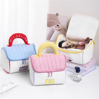 Cute little house make-up bag with high-mass concubines.