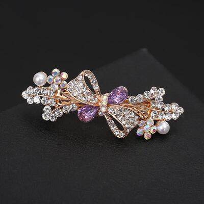 Drill the pearl hair clips   With the crystal butterf