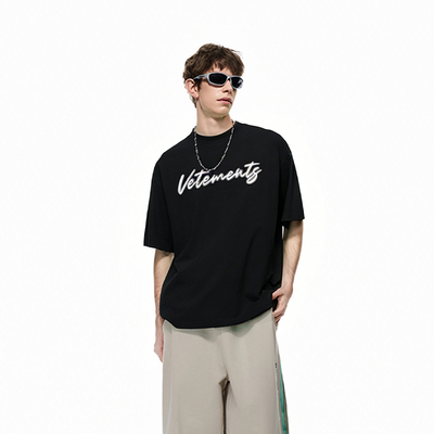 VETEMENTS26春夏男女同款简约印花闪粉宽松短袖T恤 银泰 301446