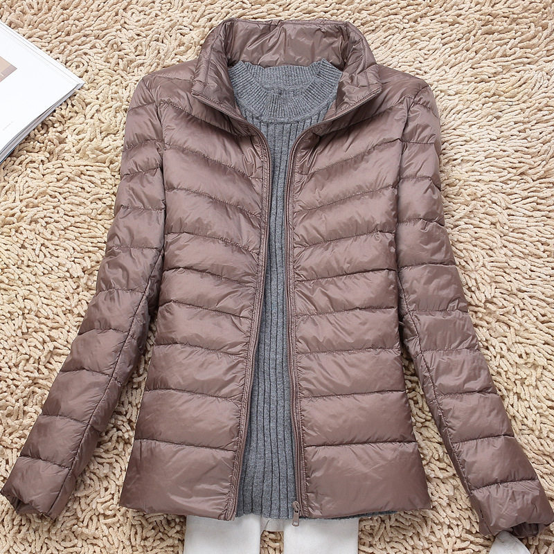 唯品会特卖断码清仓特价处理轻薄白鸭绒羽绒服女装品牌正品春秋冬