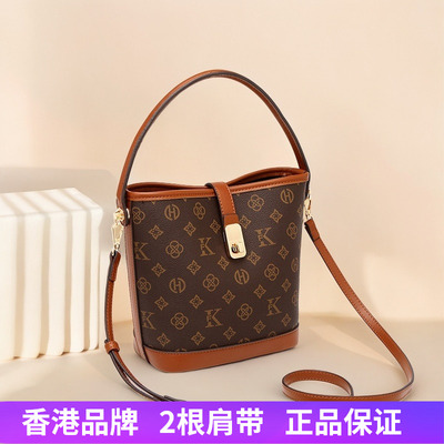 正品欧美感小号真皮女斜挎水桶包