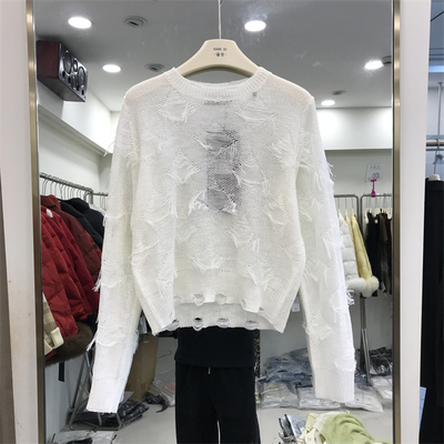 早春流苏镂空长袖针织衫女圆领时尚洋气破洞设计感百搭上衣13102