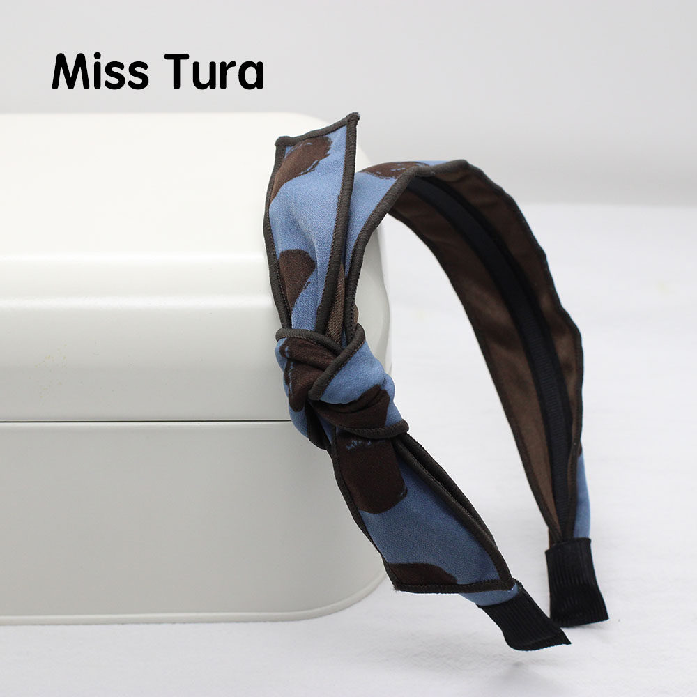 Miss Tura优雅蓝色圆点蝴蝶结可移动宽边发箍百搭头箍简约发饰_虎窝淘