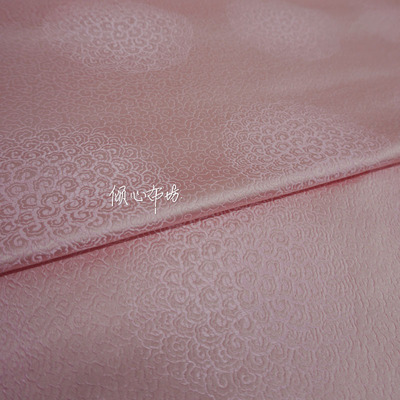 干净水粉色满地祥云团云纹织锦缎