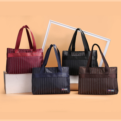 加厚防水条纹双层拉链流苏女包