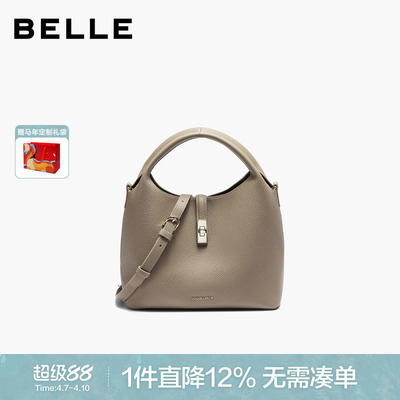 百丽头层牛皮高质感水桶包