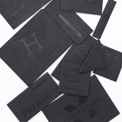 定制现货皮革商标logo压变色PU皮革标签牛仔裤皮标装饰补丁贴布贴