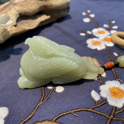 和田玉黄白河磨玉鲲鹏手把件