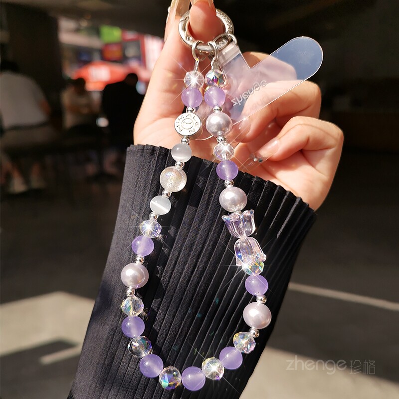 猫眼珠珠水晶短款手机挂绳手机链女士户外出行适配手机壳小挂件