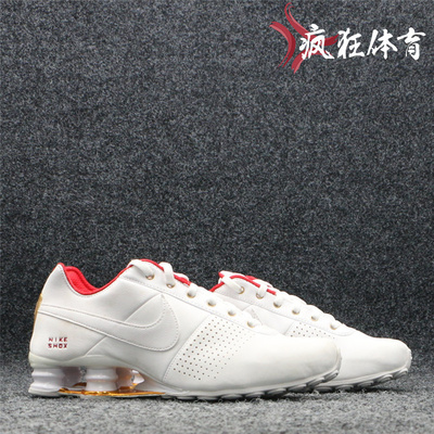 耐克女子白红金跑步鞋