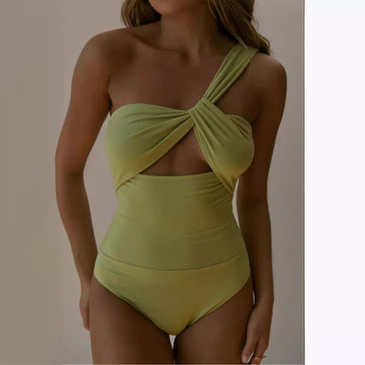 Slanted shoulder hollow solid color jumpsuit斜肩镂空纯色连体