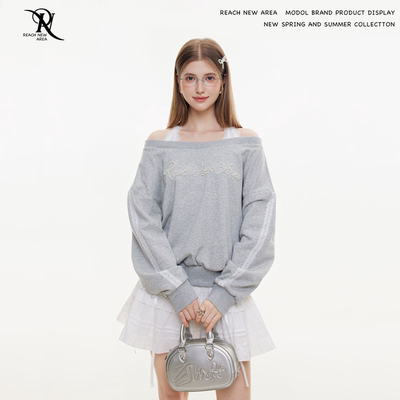 REACH原创春秋新款钉珠卫衣女斜肩长袖宽松假两件套头露肩上衣服