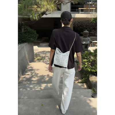 CAC夏日风情手工钩花蕾丝迷你流苏包