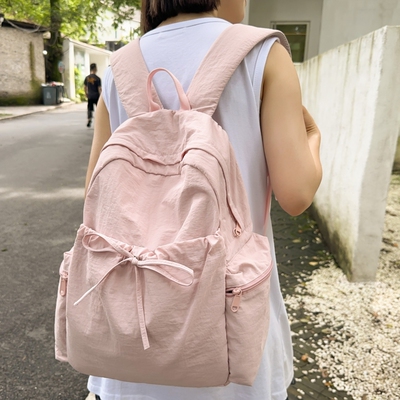曼普森出行旅行通勤包男女双肩包
