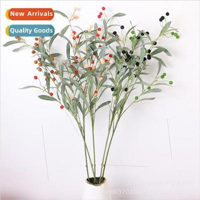 mulation plant olive leaves wh fru Ceremony flower arrangeme