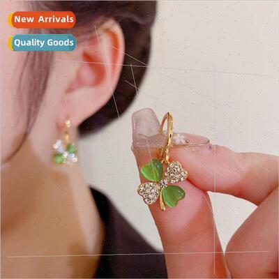 Diamond-set cat eye stone four-leaf flower ear clips delicat