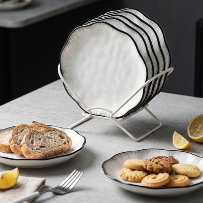 高颜值陶瓷吐骨碟家用甜点零食小碟子高端2025新款餐桌垃圾渣盘