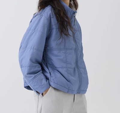 斯琴2025秋冬专柜正品雾霾蓝立领拉链薄棉服外套宽松女BEDS008115